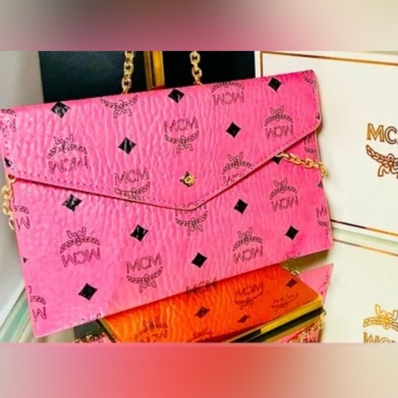 Source Unknown | Bags | Mcm Parfumes Collection Pink Envelope Clutch ...